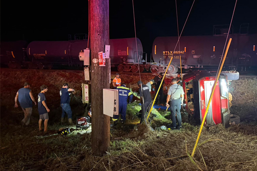 Female extricated from vehicle after collision with train ...