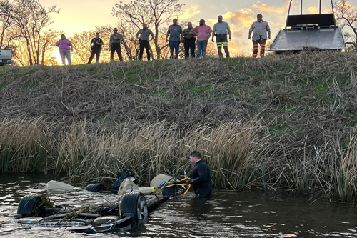 Elderly driver rescued after vehicle plunges into Cane River ...